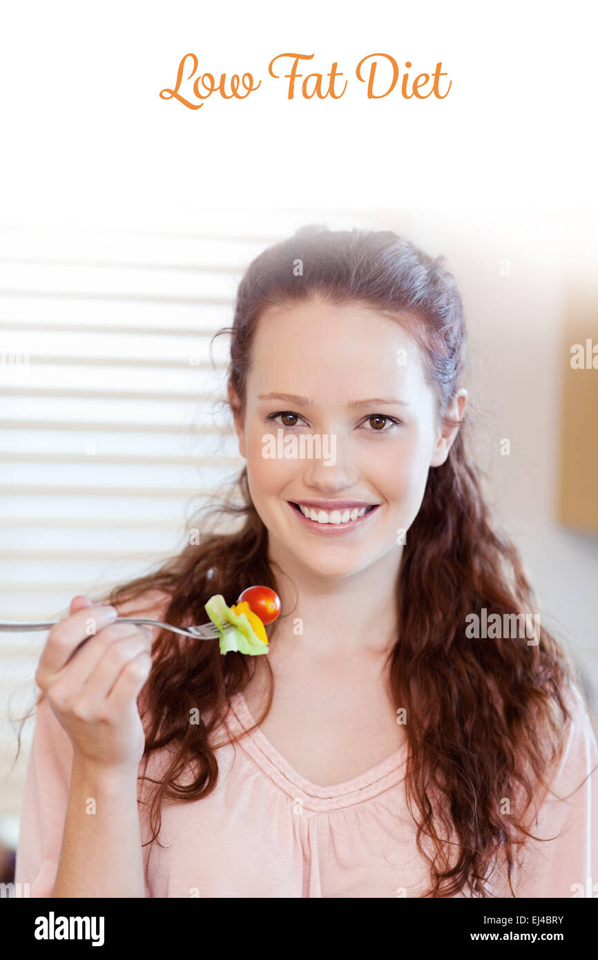 Low fat diet against girl eating salad Stock Photo - Alamy