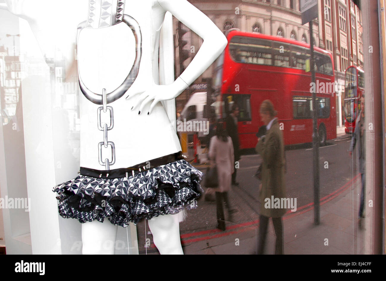 Shopping street of London reflected in a shop window Stock Photo - Alamy