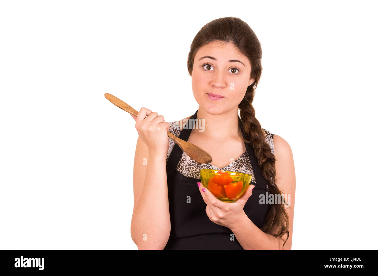 beautiful young girl eating fresh tomatoes Stock Photo - Alamy