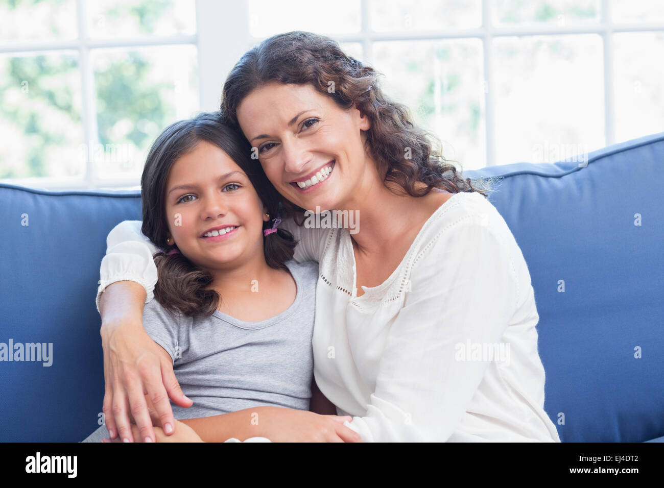 Happy Mother And Daughter Smiling At Camera Stock Photo Alamy