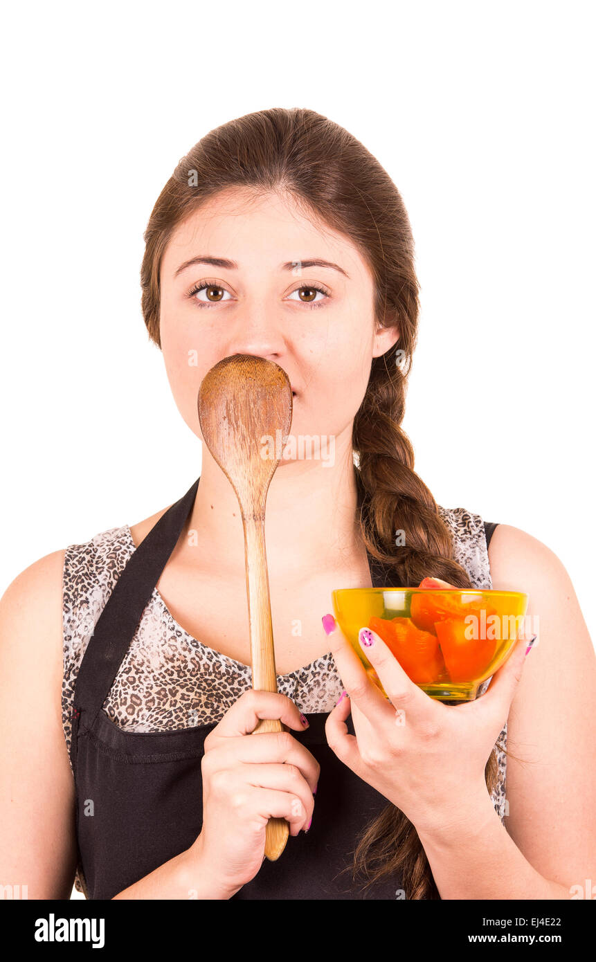 beautiful young girl eating fresh tomatoes Stock Photo - Alamy