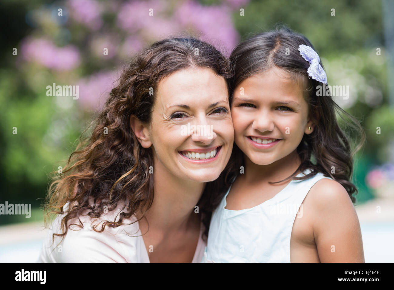 Portrait happy smiling mother hugging hi-res stock photography and images - Alamy