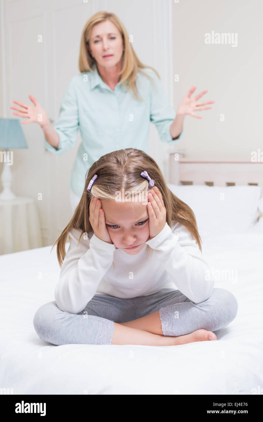 Upset mother scolding her daughter Stock Photo - Alamy