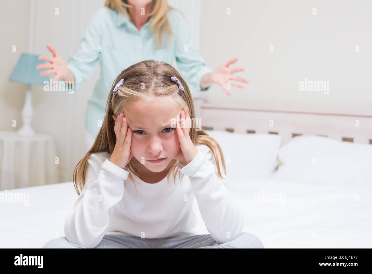 Upset mother scolding her daughter Stock Photo - Alamy
