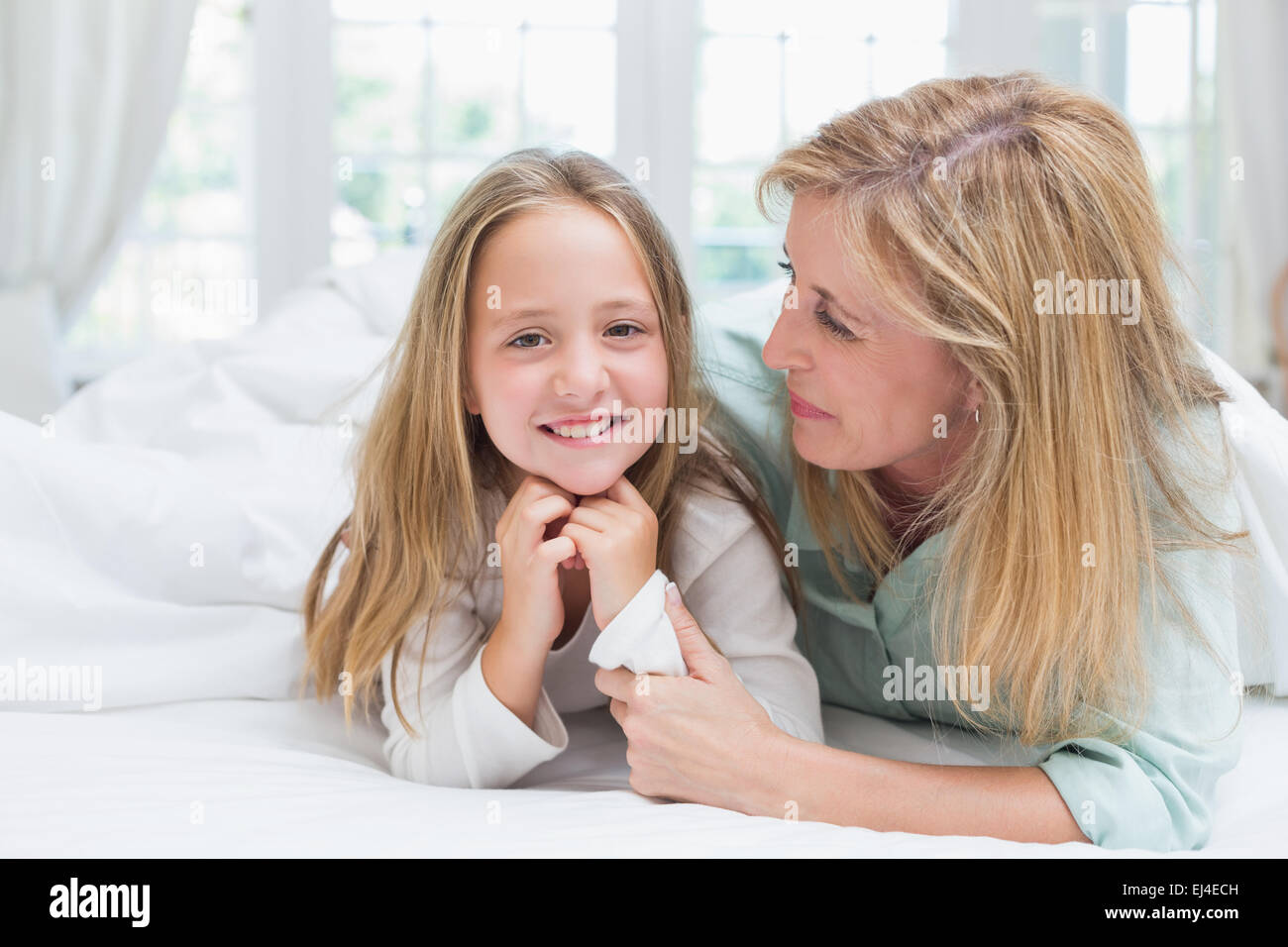 Daughter embracing mother bonding hi-res stock photography and images ...