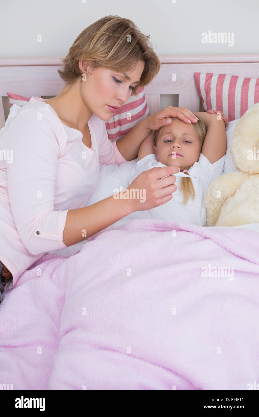 Daughter caring sick mother cold hi-res stock photography and images ...