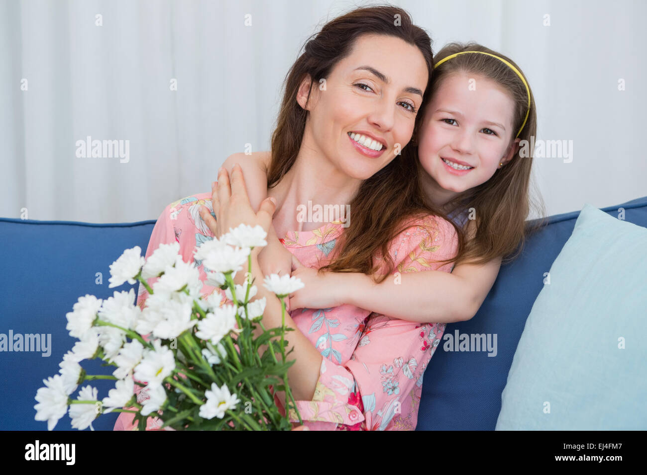 Child flowers mother giving hi-res stock photography and images - Alamy
