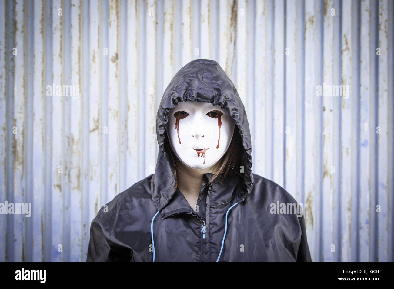 Violent woman with bloody mask, halloween Stock Photo - Alamy
