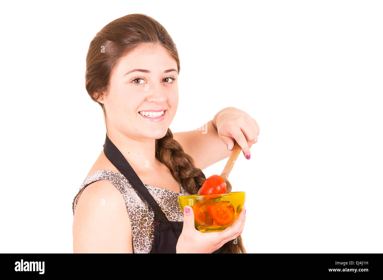 beautiful young girl eating fresh tomatoes Stock Photo - Alamy