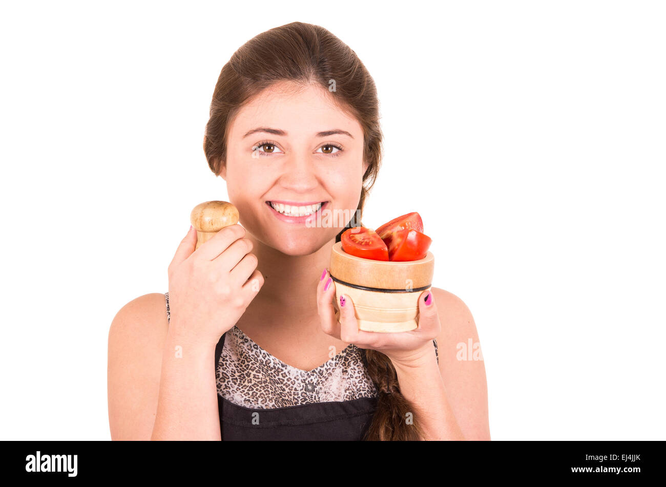beautiful young girl eating fresh tomatoes Stock Photo - Alamy