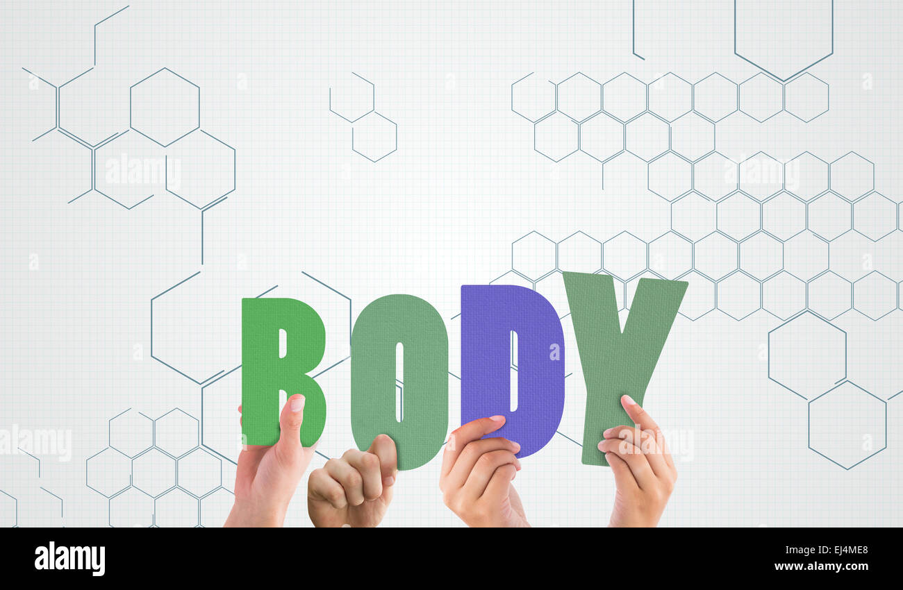 Composite image of hands holding up body Stock Photo - Alamy