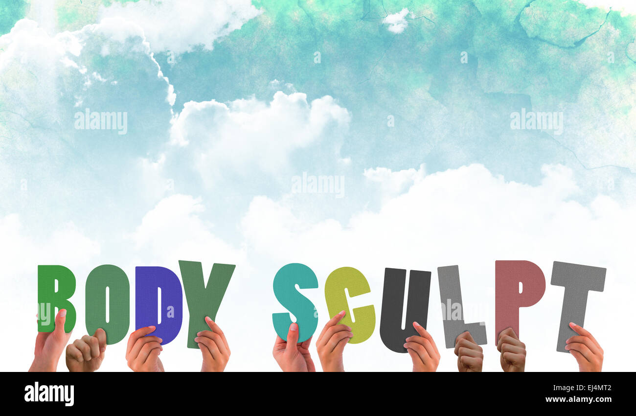 Composite image of hands holding up body scuplt Stock Photo - Alamy