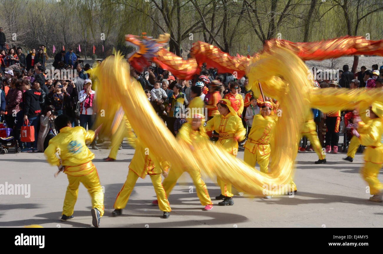 Handan, China's Hebei Province. 21st Mar, 2015. People perform dragon ...