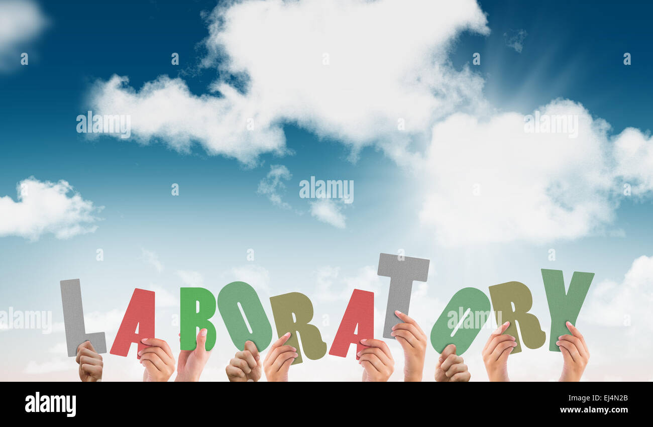 Composite image of hands holding up laboratory Stock Photo - Alamy