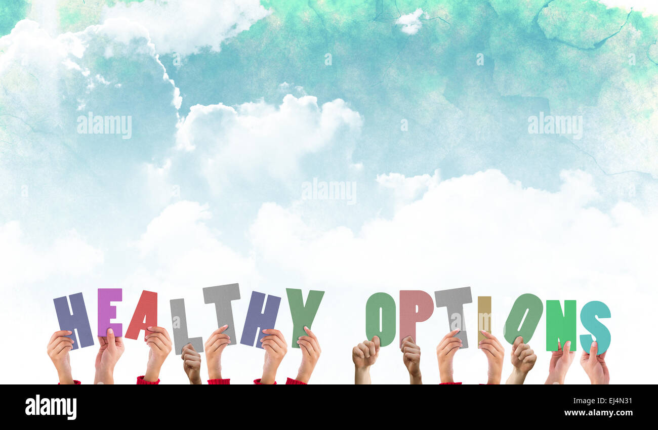 Composite image of hands holding up healthy options Stock Photo - Alamy