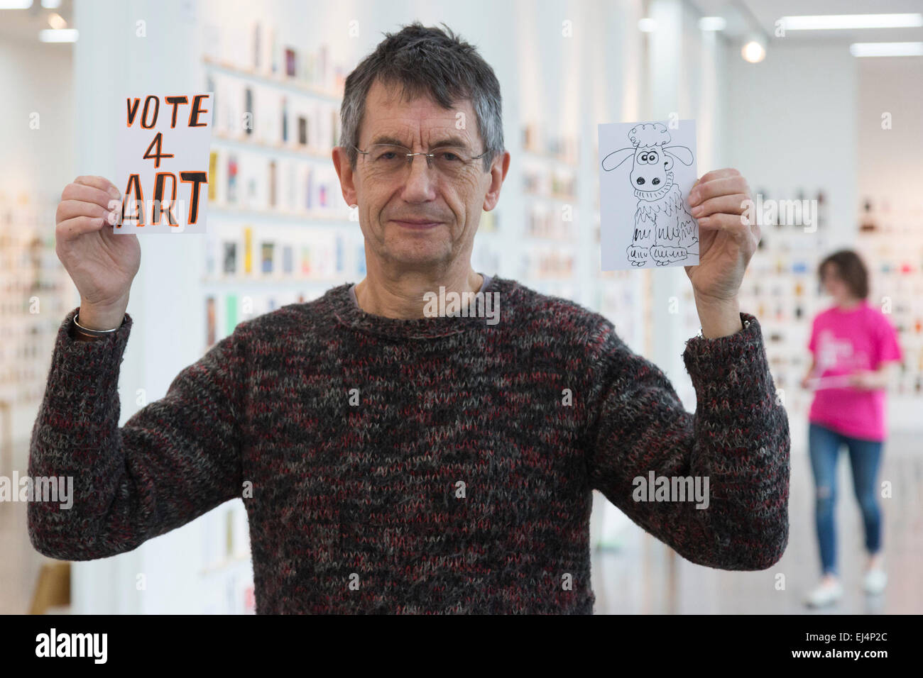 London, UK. 21 March 2015. Pictured: Peter Hope from London holds up ...