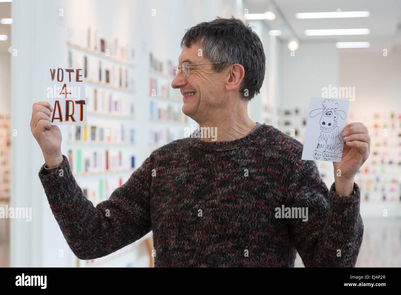 London, UK. 21 March 2015. Pictured: Peter Hope from London holds up ...