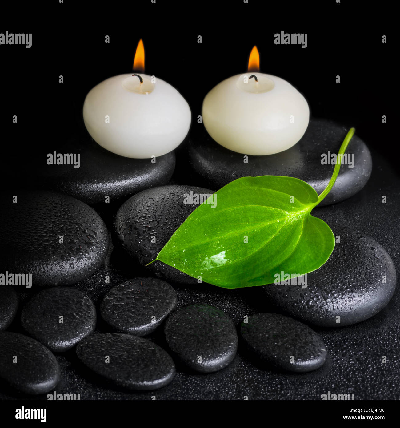 Stones massage two candles hi-res stock photography and images - Alamy