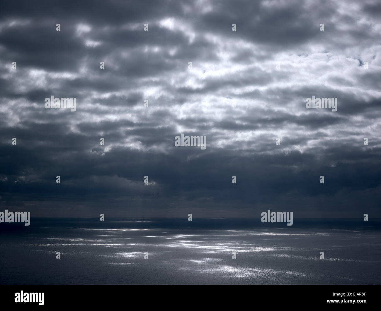 Dappled sunlight from clouds on the surface of the ocean off Northland ...