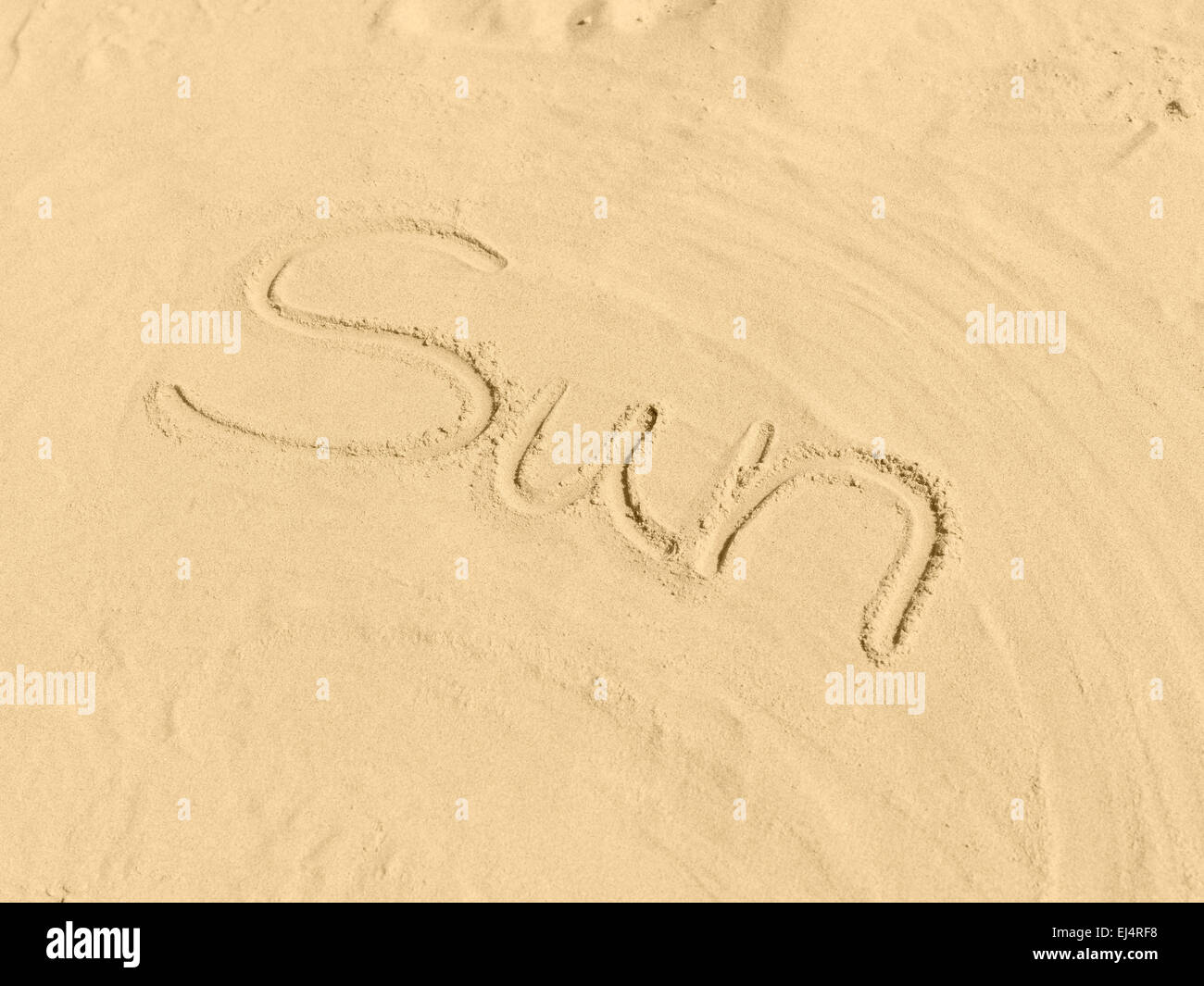 Sun am Strand in Sand gemalt Stock Photo - Alamy