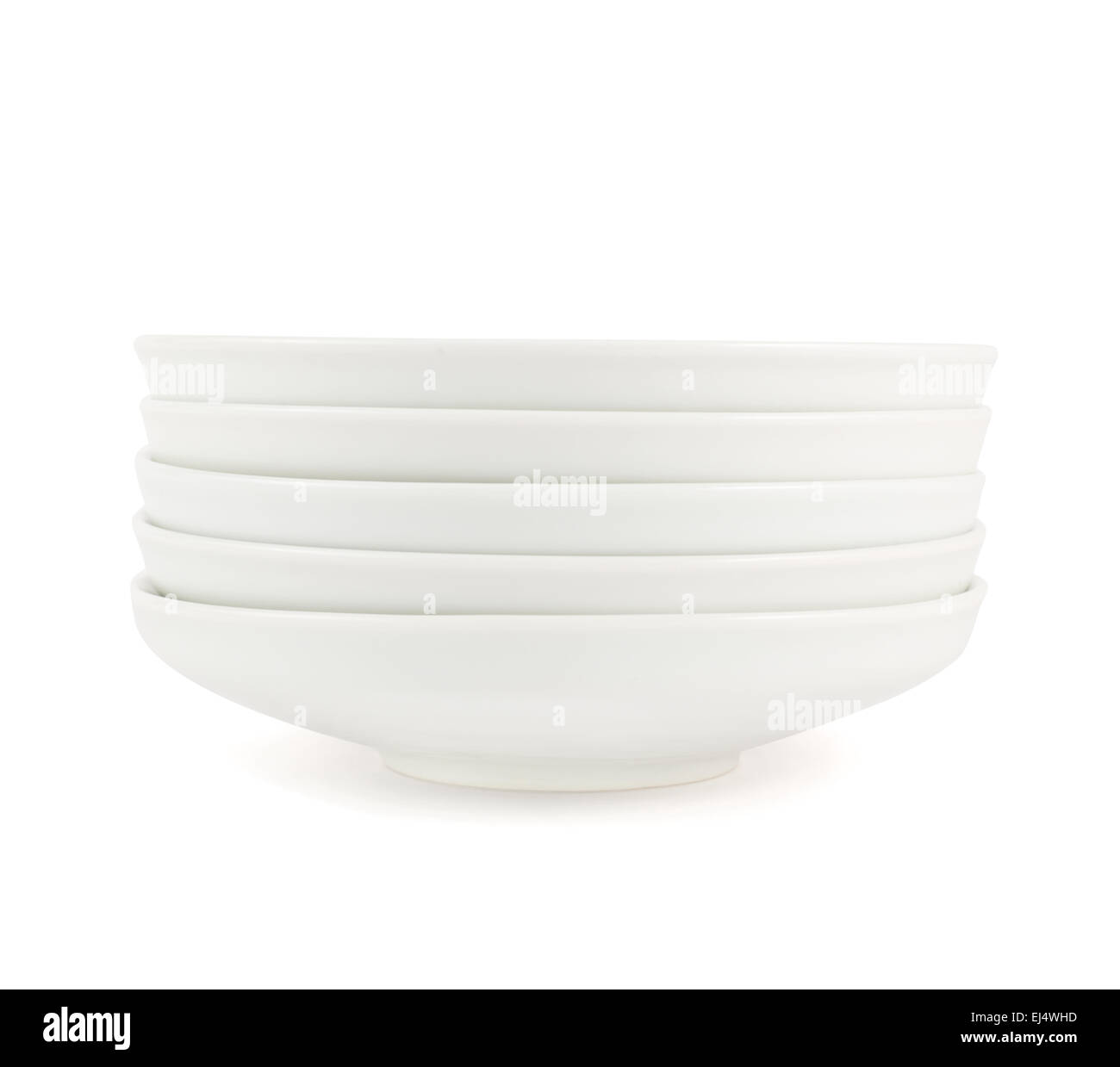 Stack pile of white ceramic plate dishes Stock Photo - Alamy