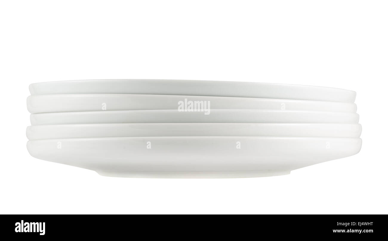 Pile of clean white dish plates isolated Stock Photo - Alamy