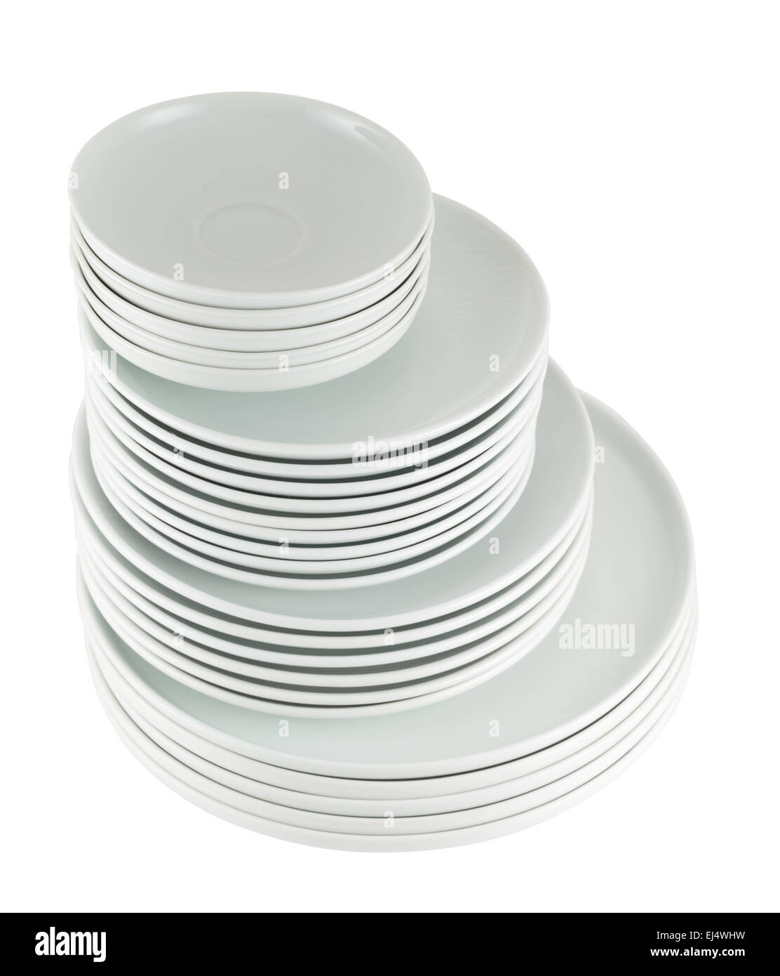 Pile of clean white dish plates isolated Stock Photo - Alamy
