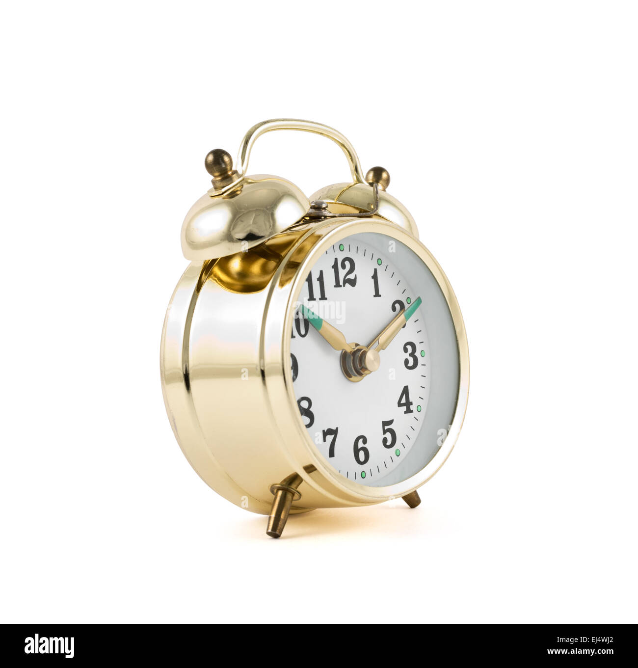 Golden mechanical alarm clock isolated Stock Photo - Alamy