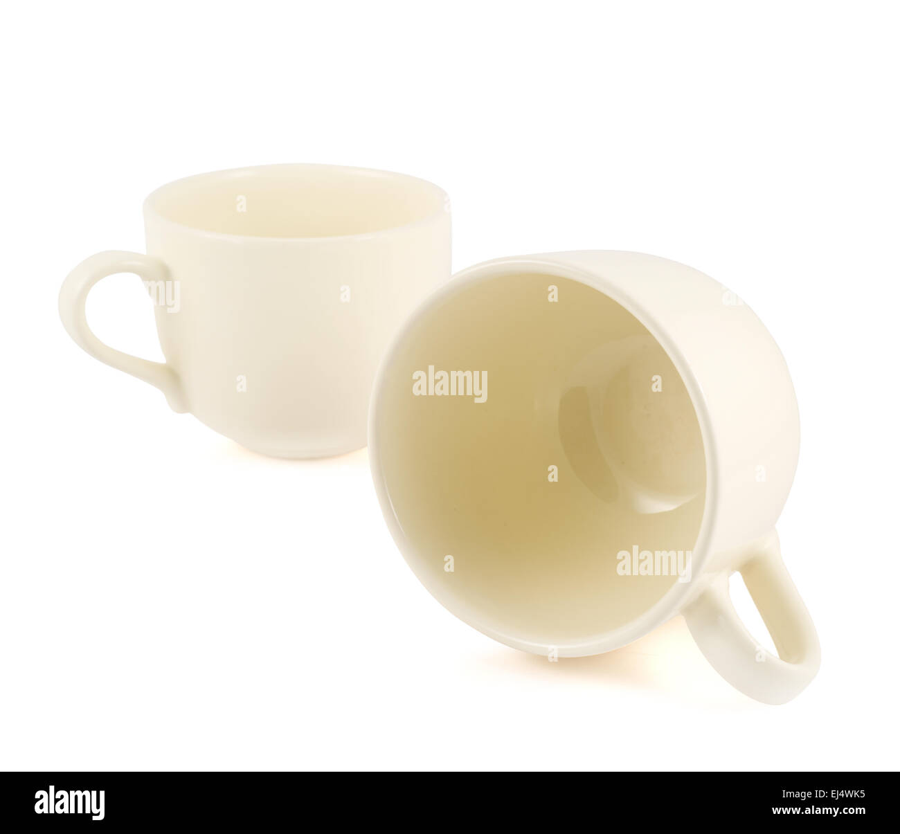 Two ceramic cream colored cups composition Stock Photo - Alamy