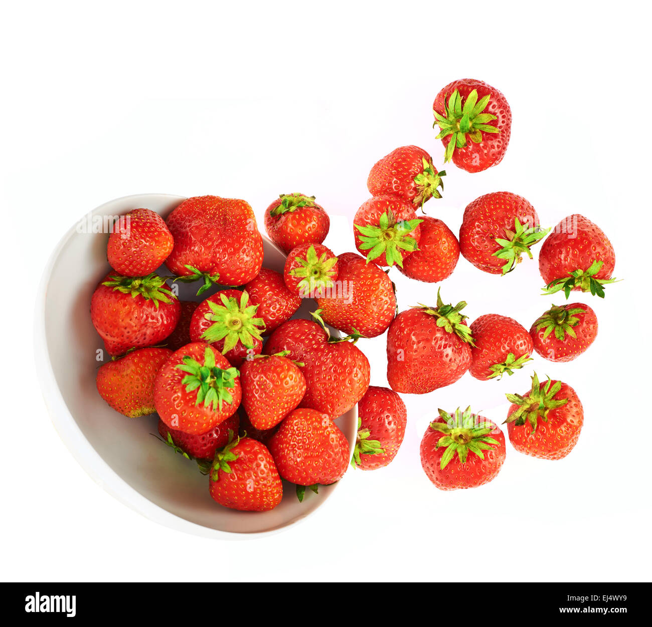 Strawberries falling fresh bowl hi-res stock photography and images - Alamy