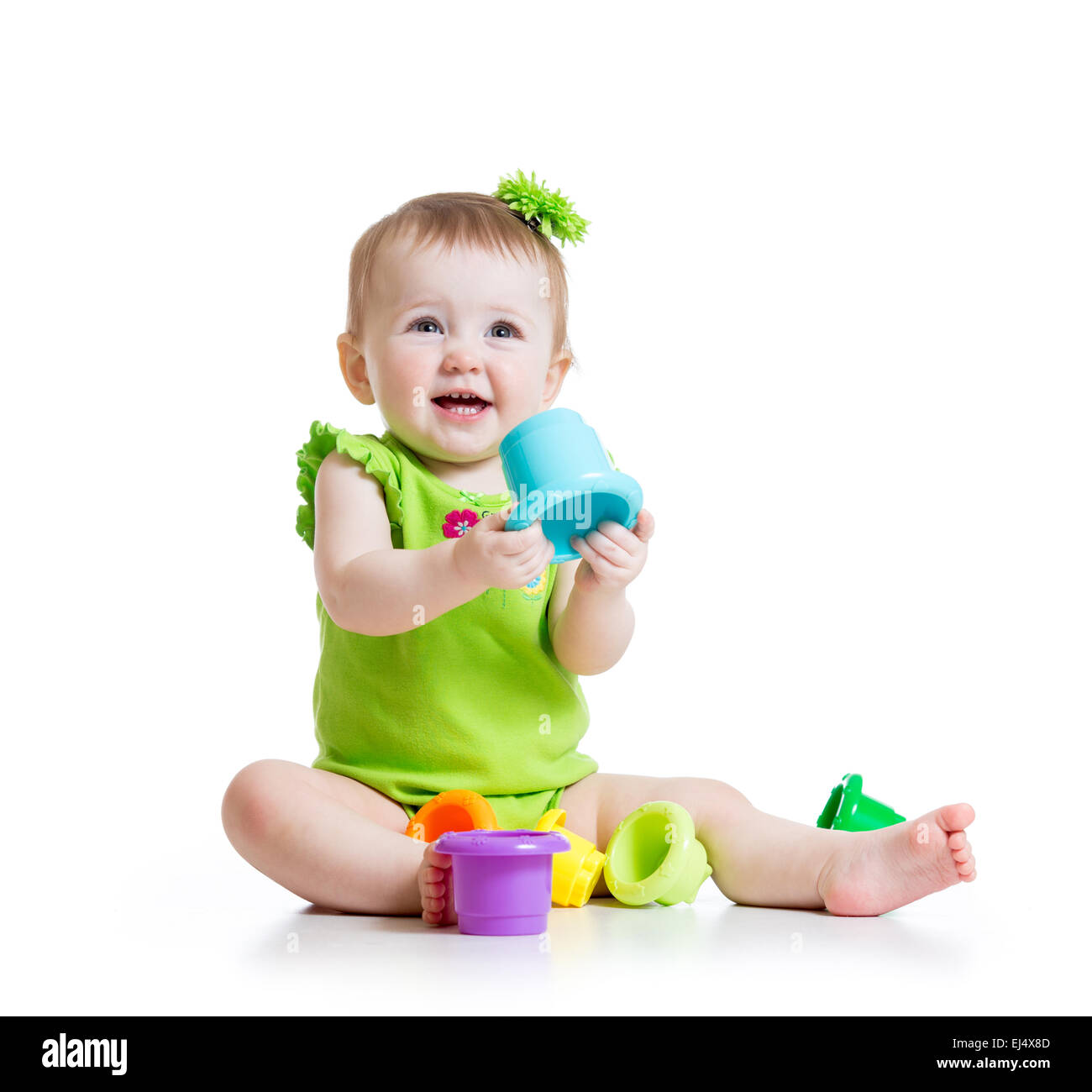 little girl playing with color toys Stock Photo - Alamy