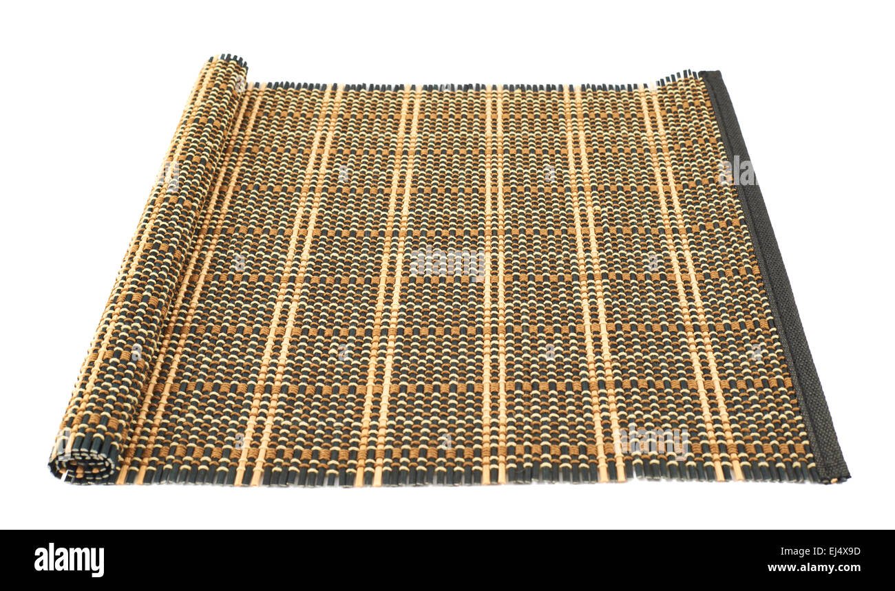 Rolled straw mat isolated Stock Photo - Alamy