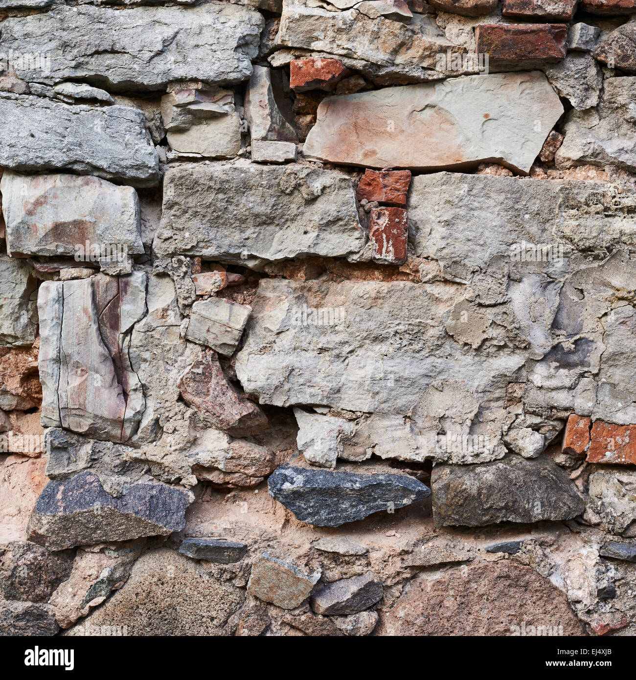 Old stone wall fragment Stock Photo - Alamy