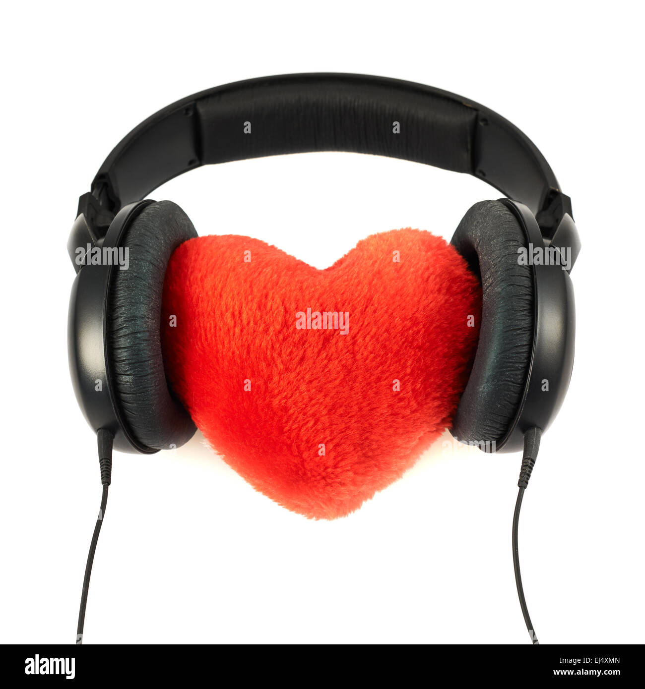 Headphones put on a plush heart Stock Photo - Alamy