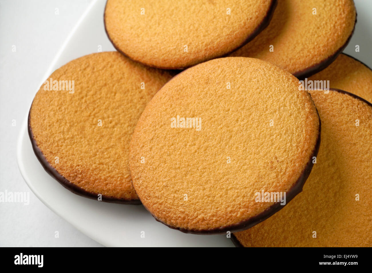 Chocolate covered cookies Stock Photo - Alamy
