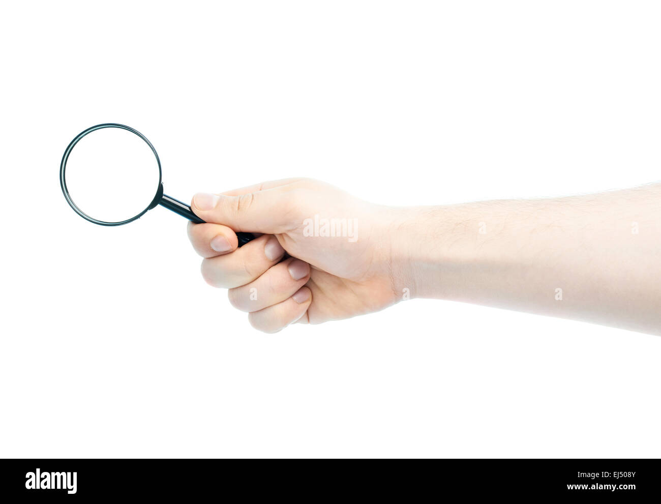 Caucasian male hand holding magnifying glass Stock Photo - Alamy