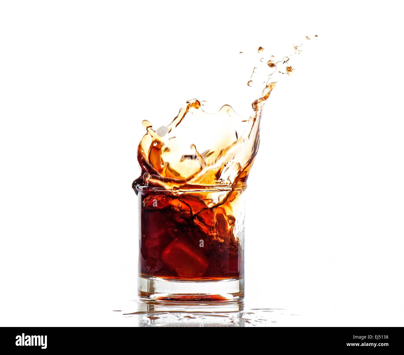splash of cola in glass isolated on white background Stock Photo - Alamy