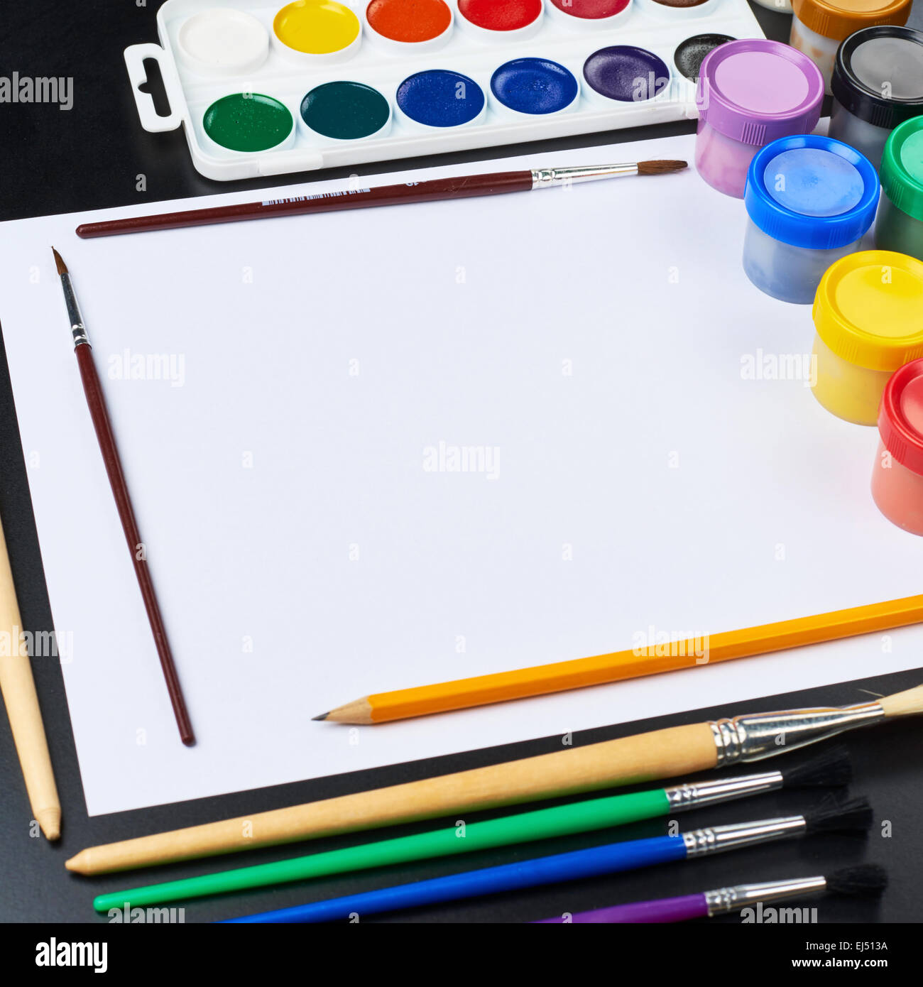 Multiple drawing paints and brushes Stock Photo - Alamy
