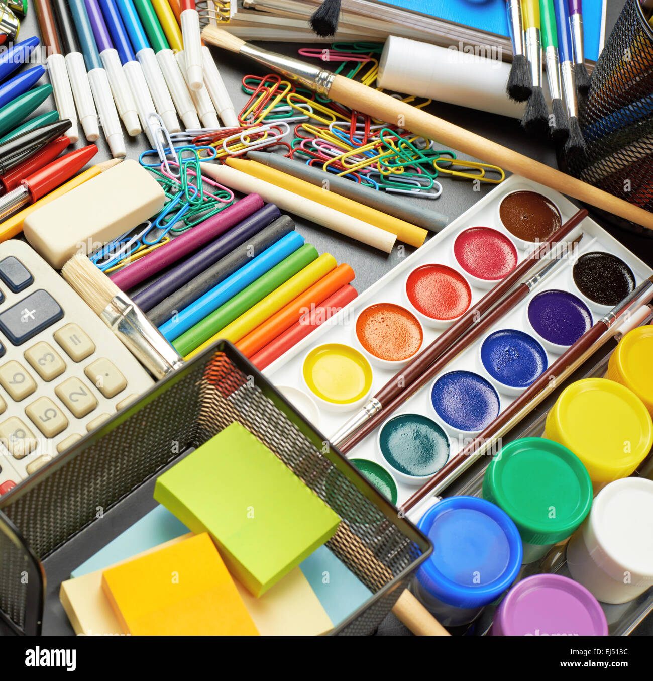 Desk covered with multiple stationery Stock Photo - Alamy
