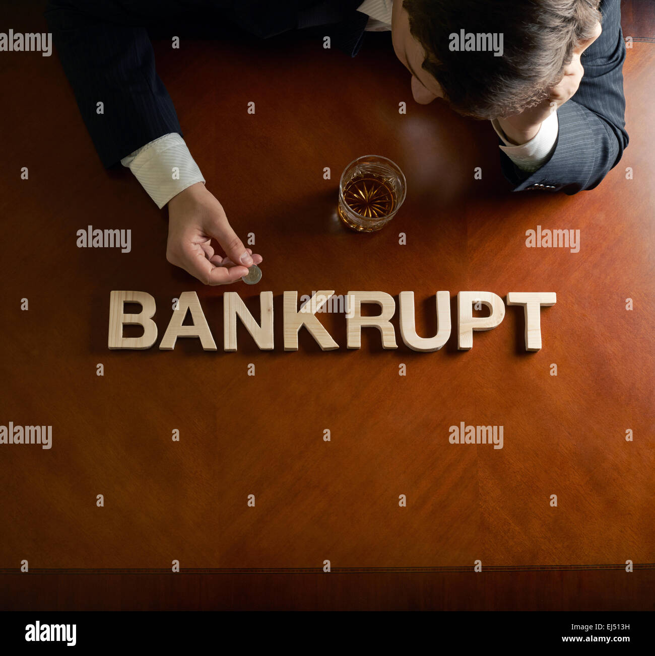 Word Bankrupt and devastated man composition Stock Photo - Alamy