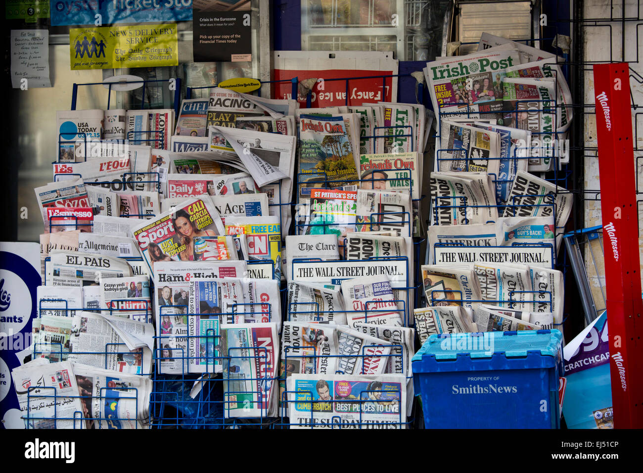 Newspapers foreign international rack shop outside Stock Photo - Alamy