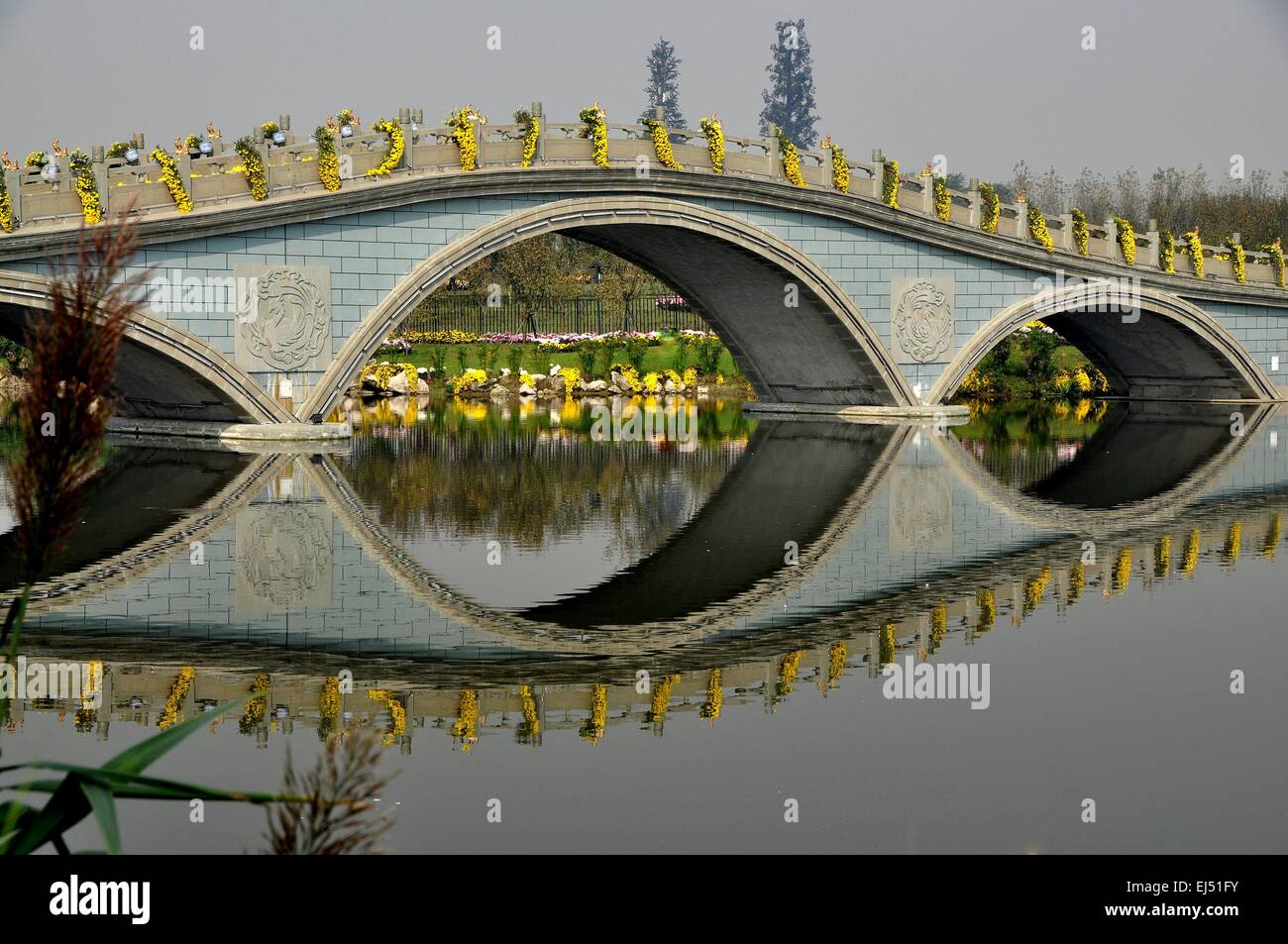 Qingbaijiang, China: A graceful Chinese bridge with three arches ...