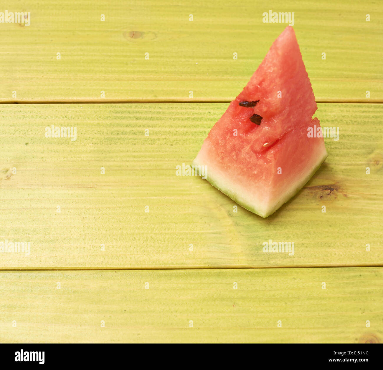 Single piece of watermelon composition Stock Photo - Alamy