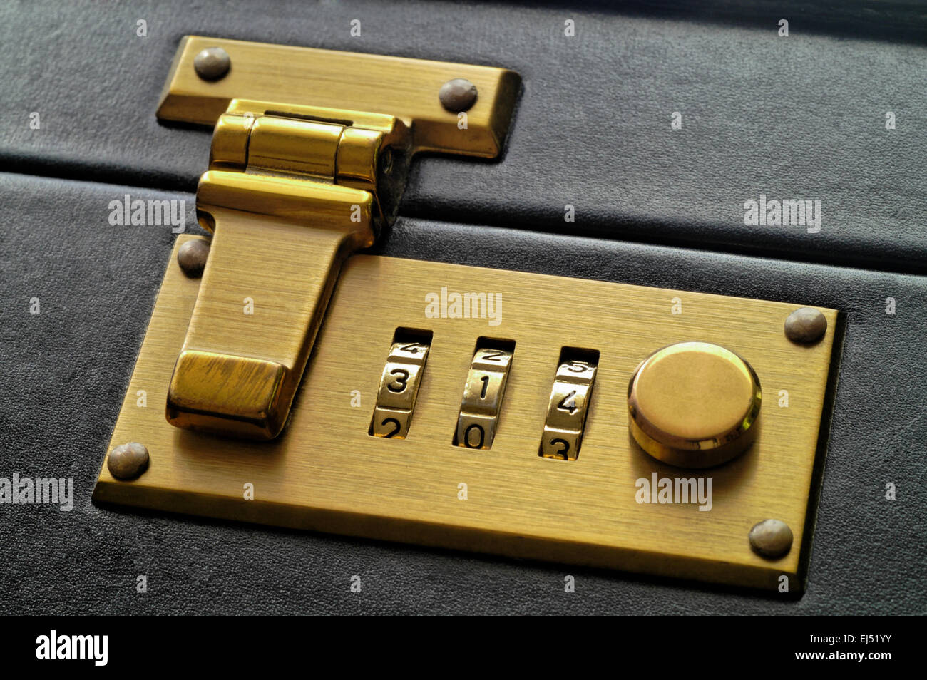 Briefcase detail closeup showing combination lock Stock Photo - Alamy