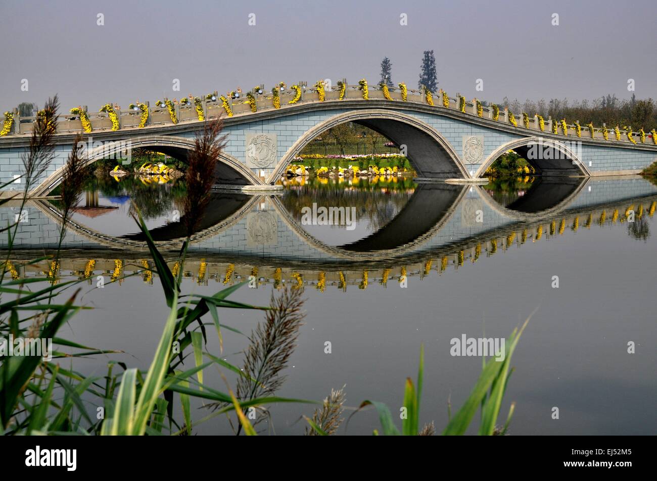 Qingbaijiang, China: A graceful Chinese bridge with three arches ...