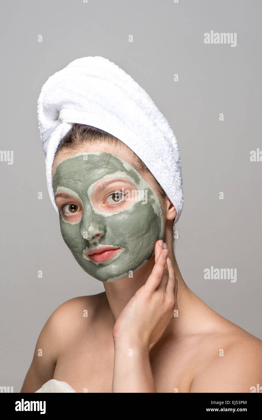 Beautiful woman with facial mask hi-res stock photography and images ...