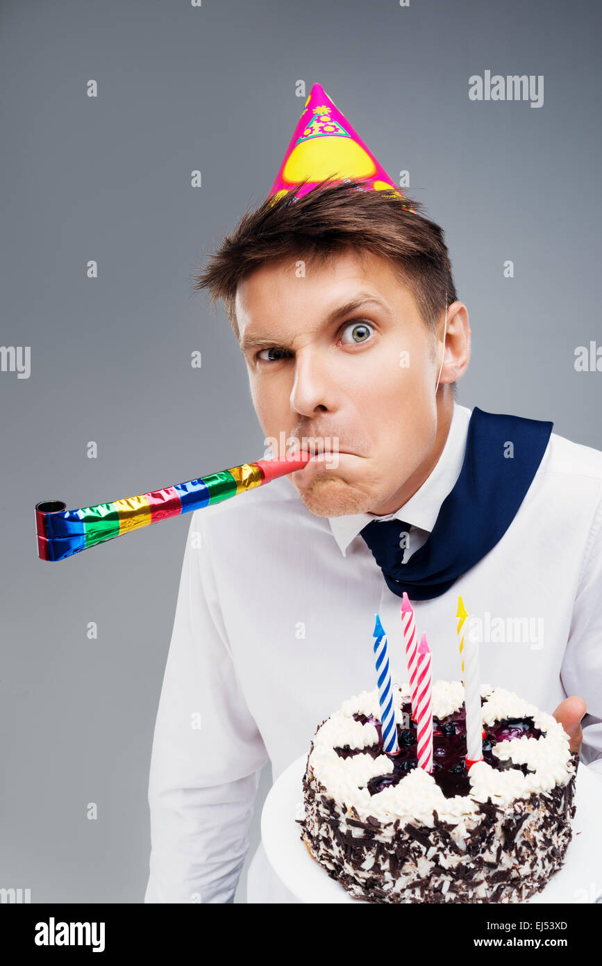 Young office manager holding cake Stock Photo - Alamy