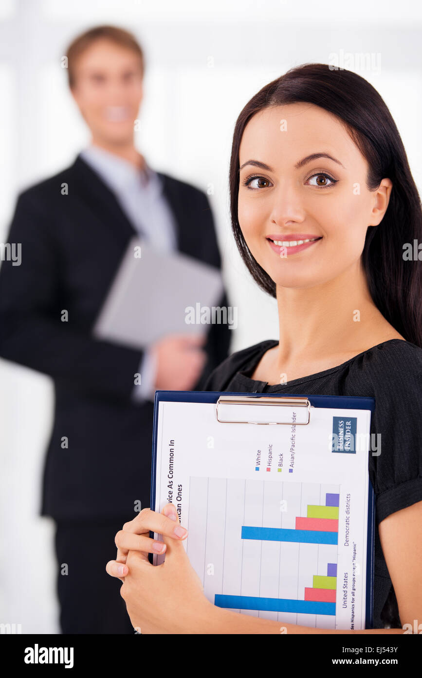 Businesswoman holding folders with diagrams Stock Photo - Alamy Businesswoman holding folders with diagrams Stock Photo - Alamy
