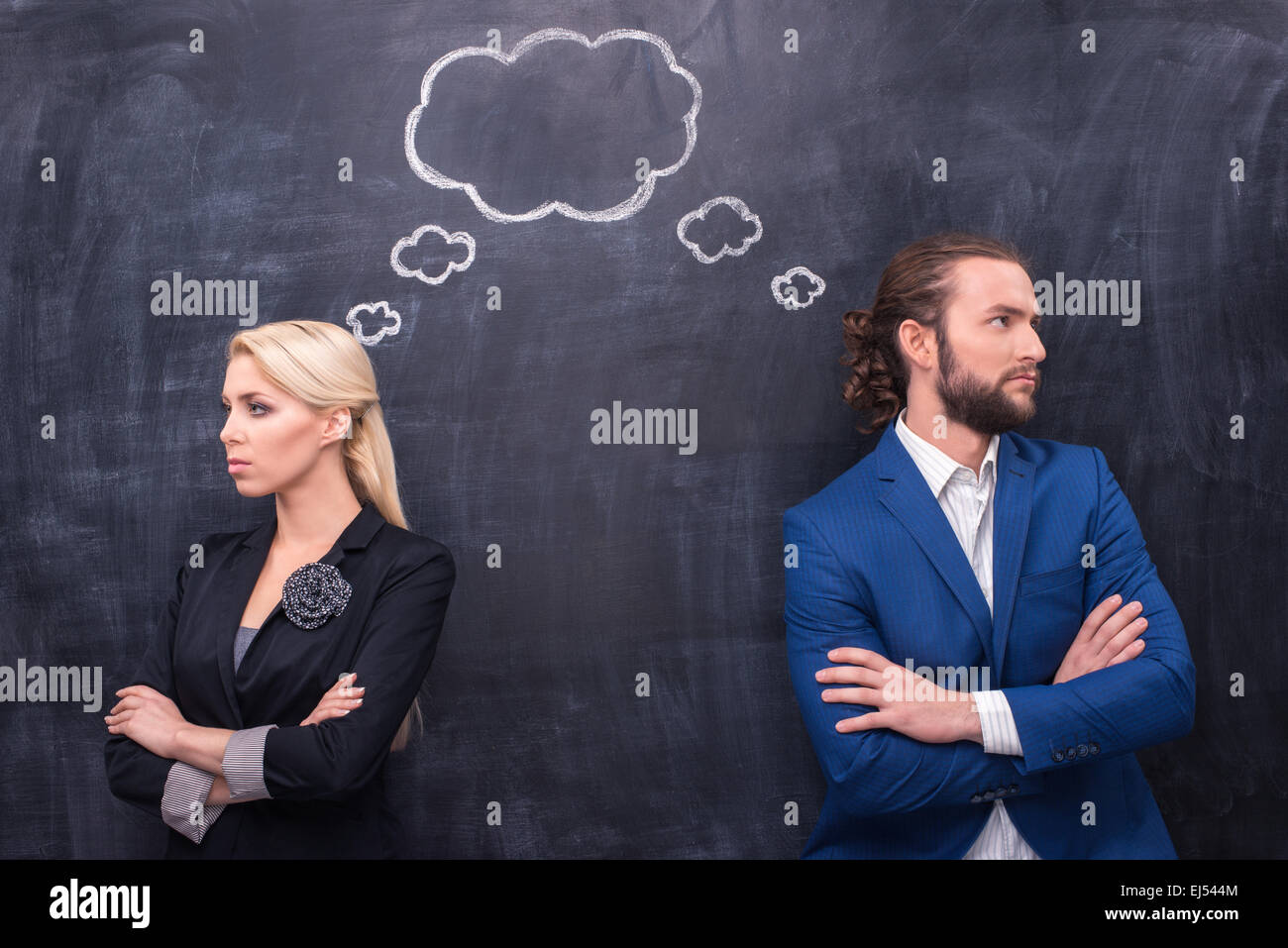 Male and female thinking together on th blackboard background Stock ...