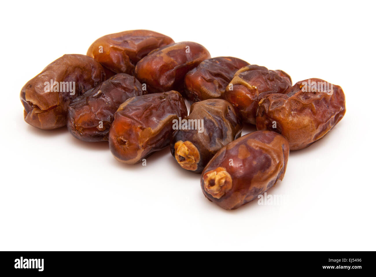Halawi dates isolated on a white background. Halawi dates originate ...